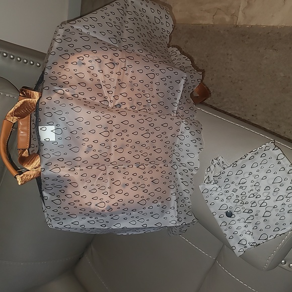 HolidaygallCloset | Bags | Purse Raincoat Wcarrying Bag Protect Your ...